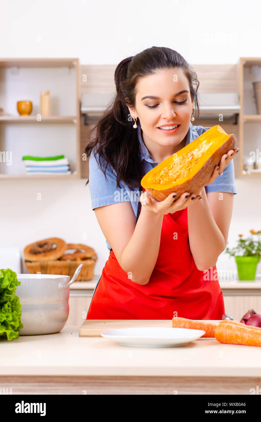 Young woman smelling food cooking hi-res stock photography and images ...