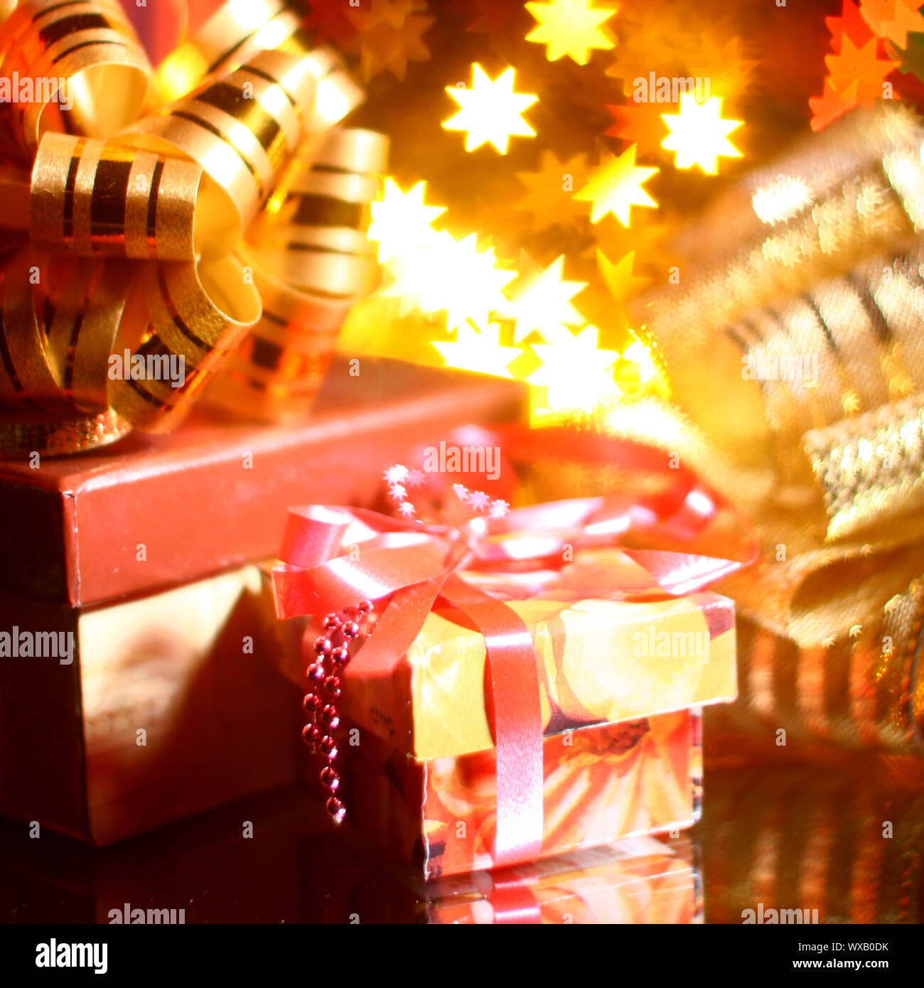 holiday gifts background warm stars Stock Photo - Alamy