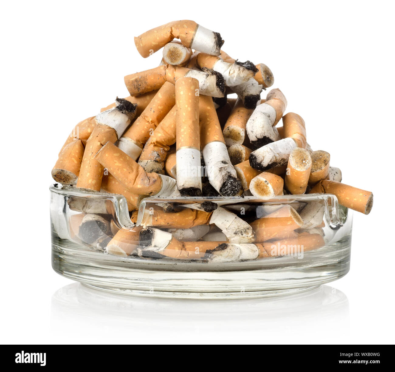 Cigarettes in an ashtray isolated on white background Stock Photo - Alamy