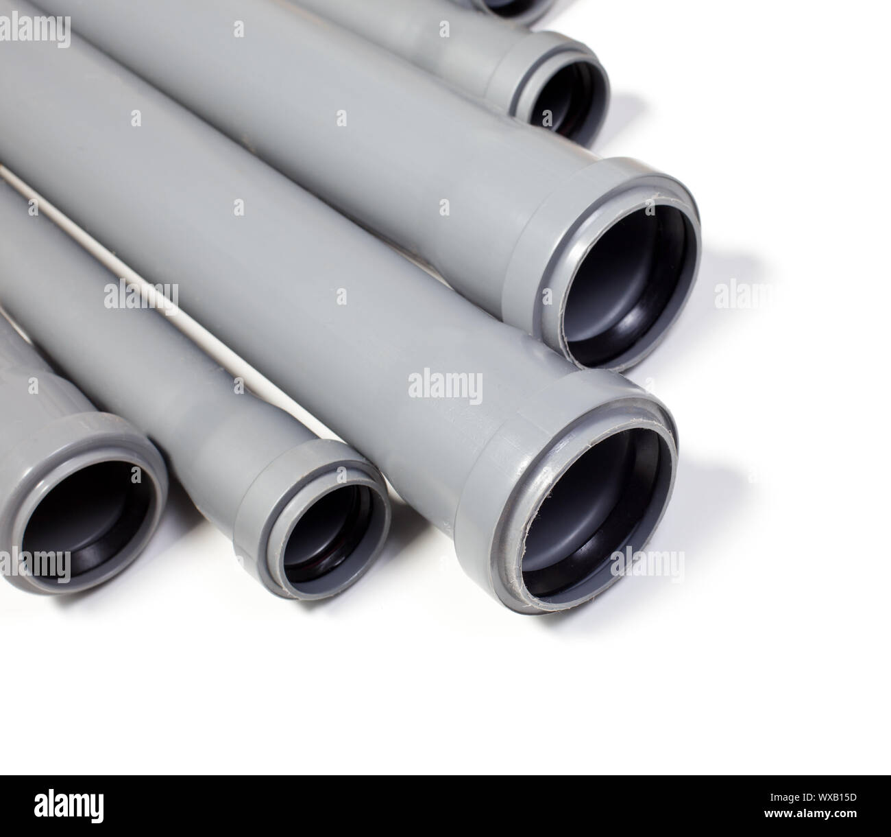 Grey PVC sewer pipes on white background Stock Photo - Alamy