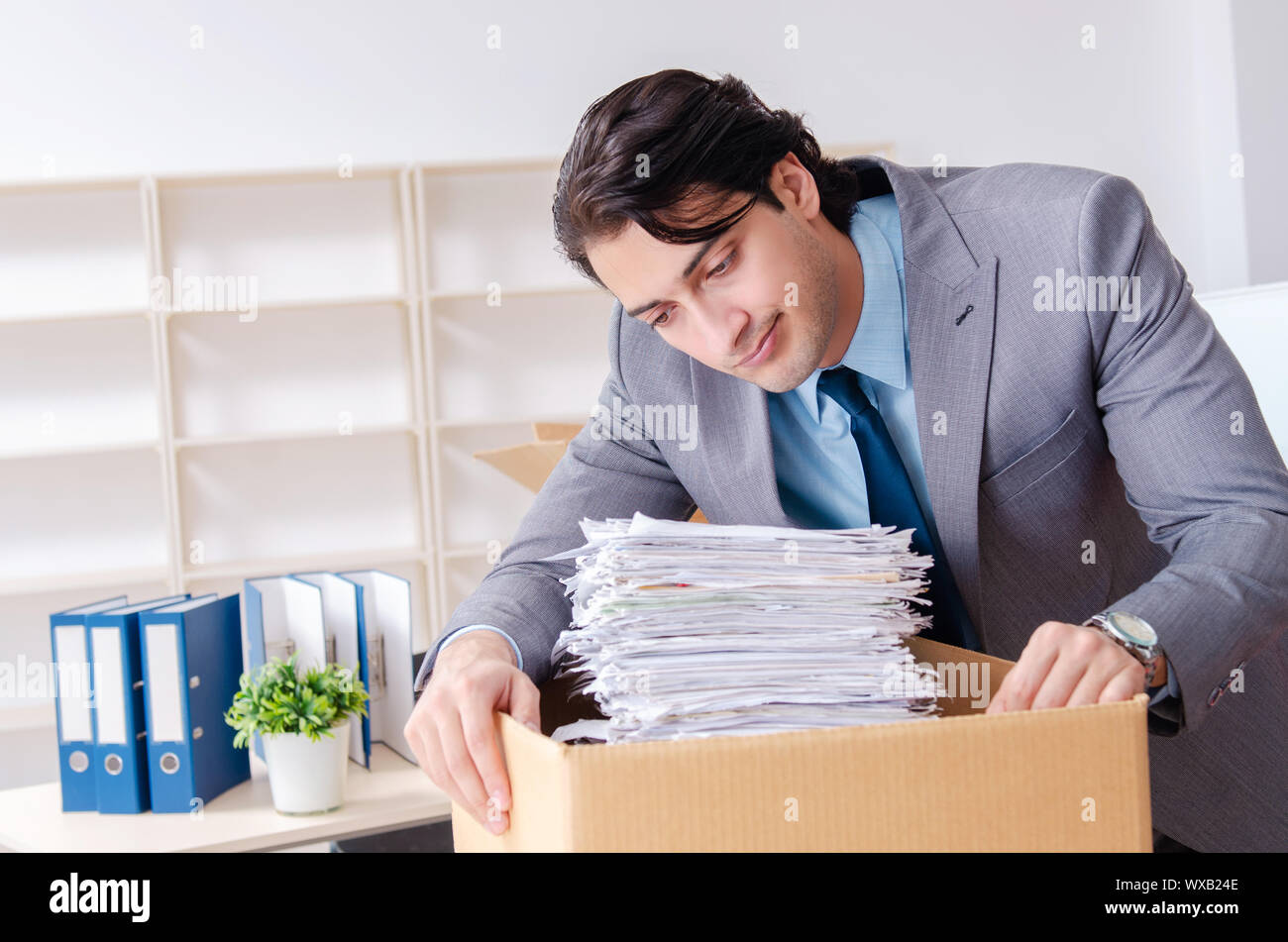 Lay off boxes office hi-res stock photography and images - Alamy