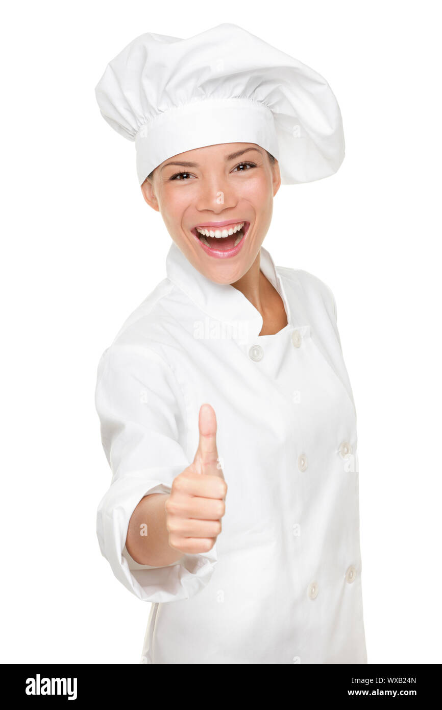 Chef woman - happy thumbs up. Smiling and cheerful female chef, cook or ...