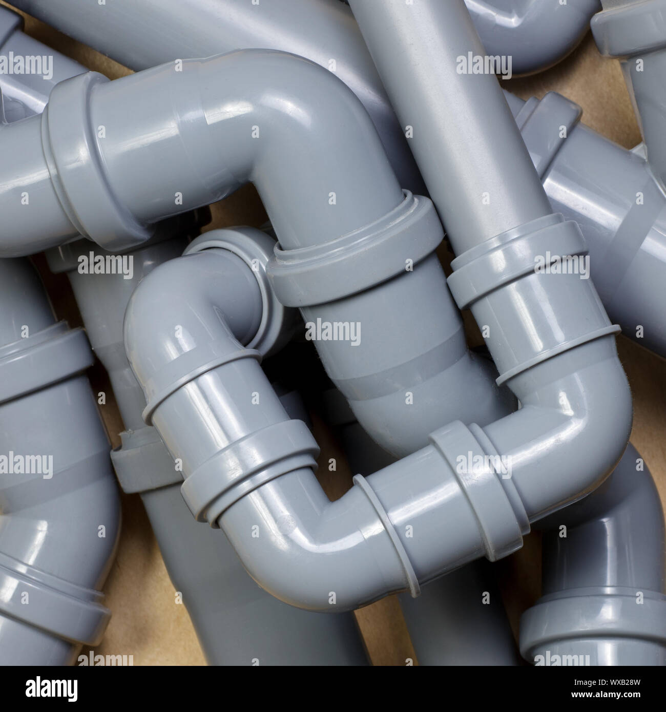 Grey PVC sewer pipes background Stock Photo - Alamy