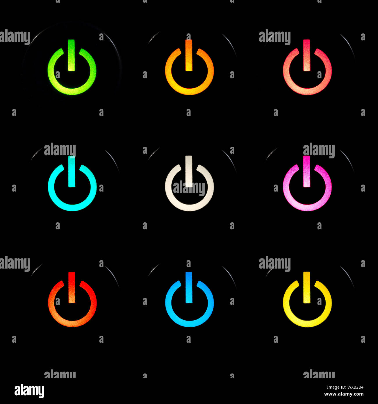 Glowing power buttons on black background Stock Photo - Alamy