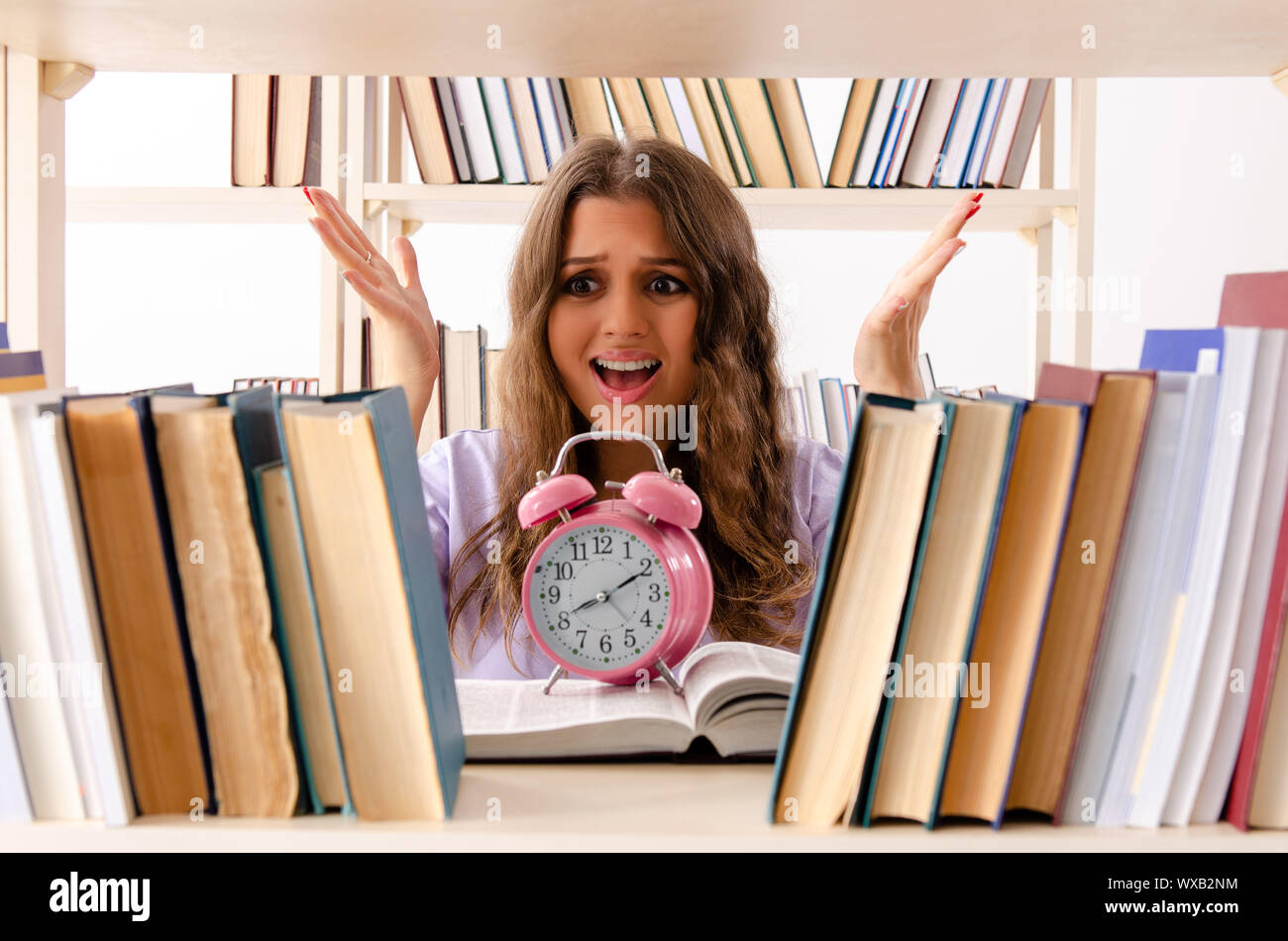Stressed female student clock hi-res stock photography and images - Alamy