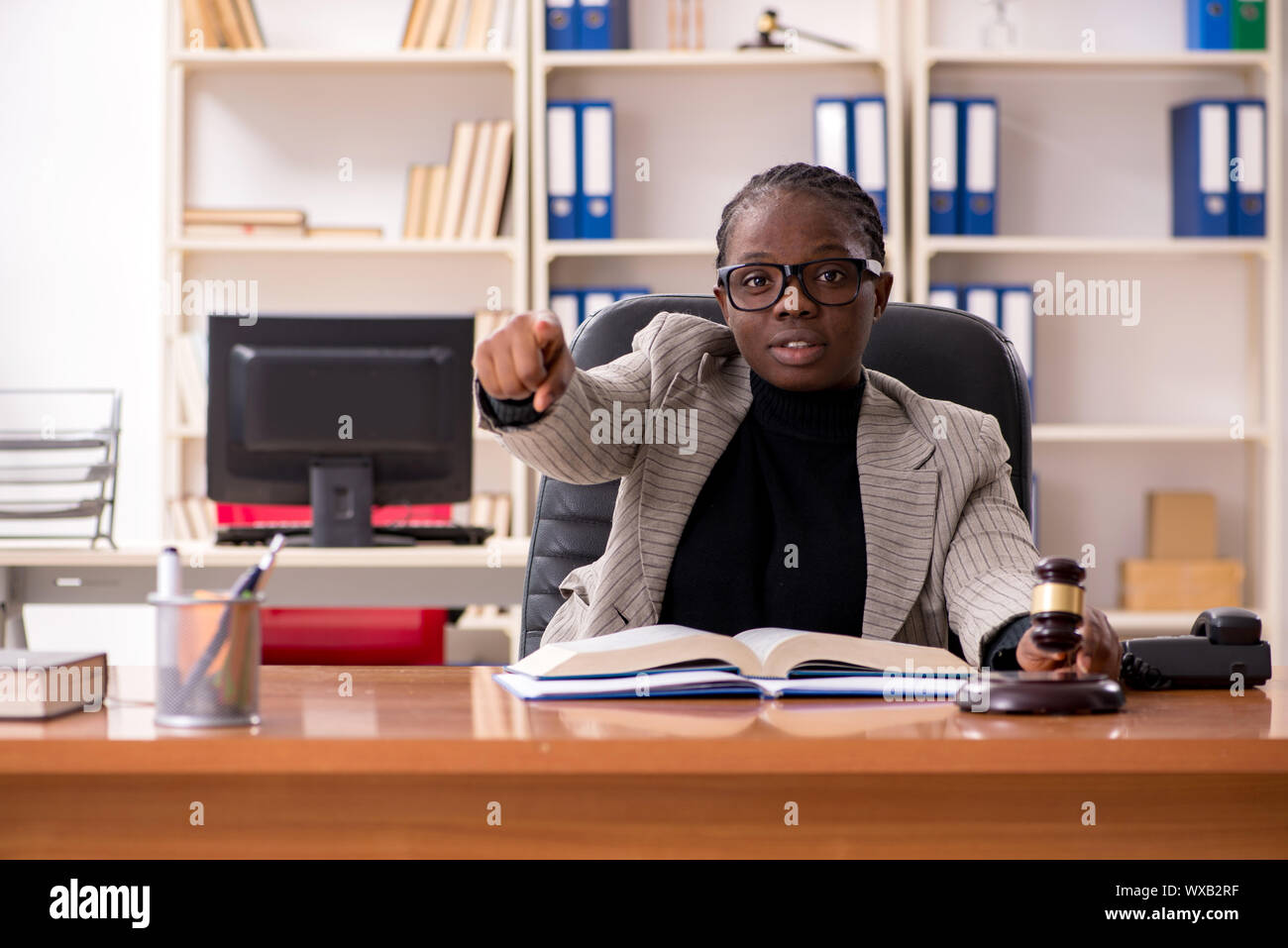 Black female lawyer in courthouse Stock Photo - Alamy