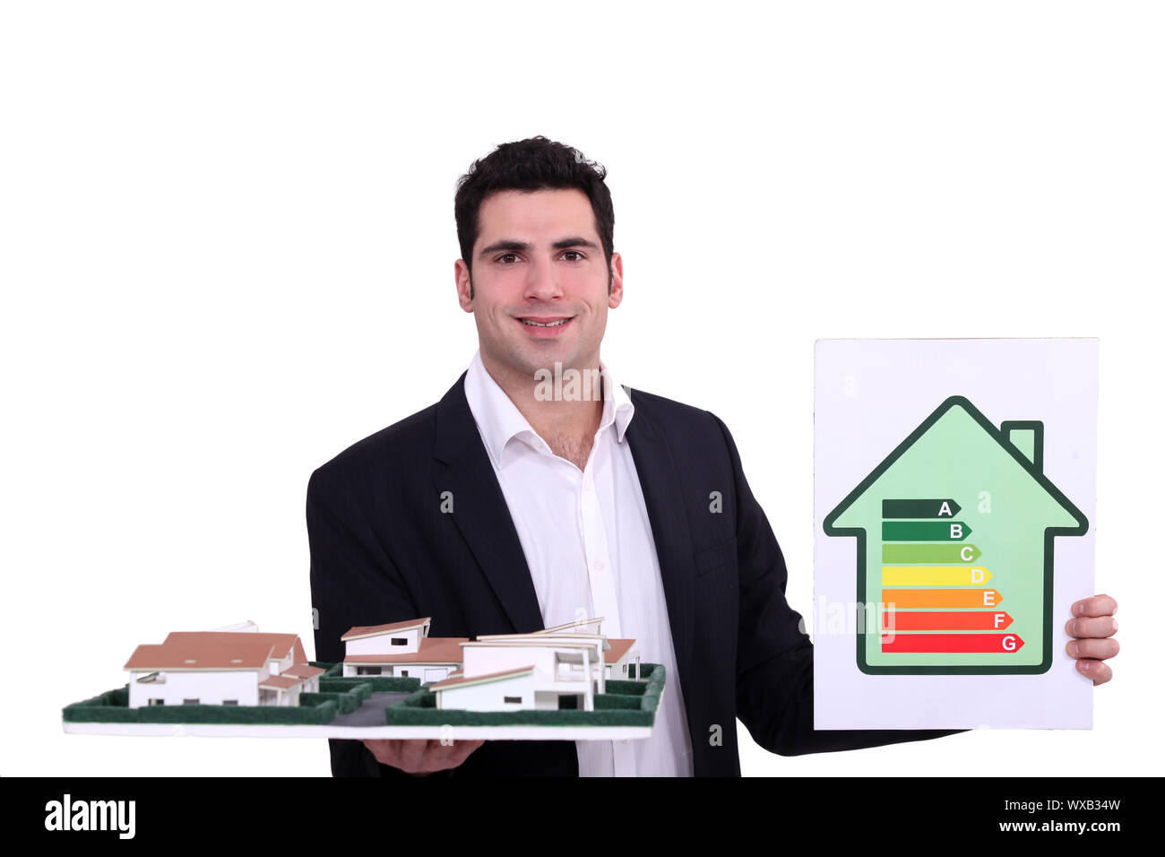 Architect with an energy rating sign Stock Photo - Alamy