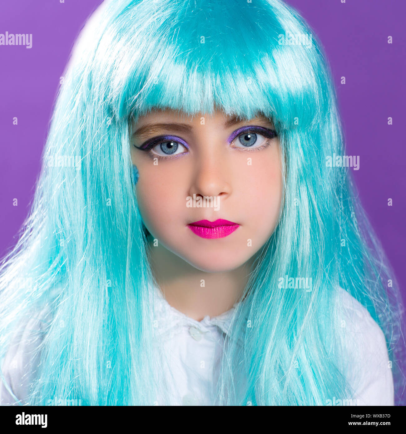 Children girl with blue turquoise long wig as fashiondoll on purple ...