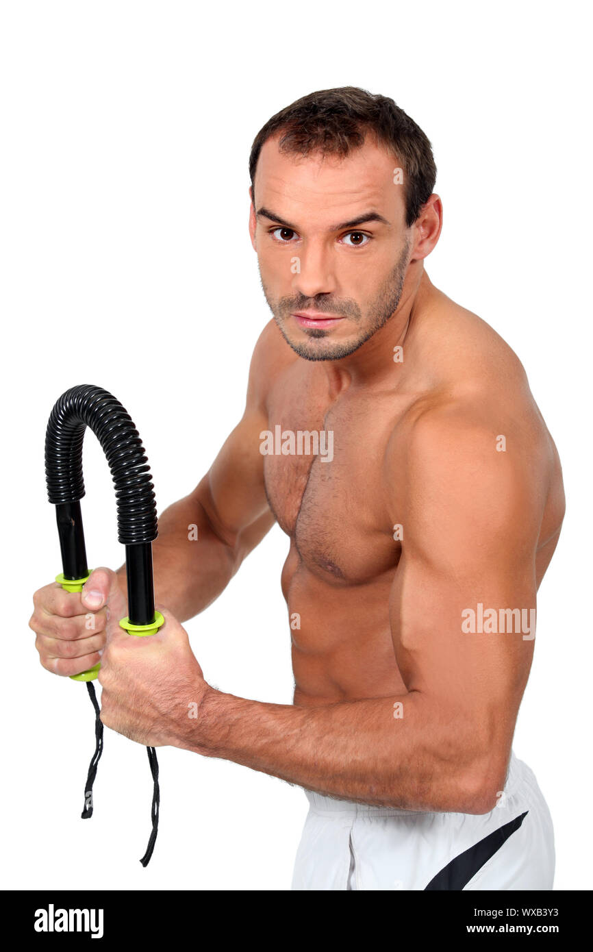Man bending a bar Stock Photo - Alamy
