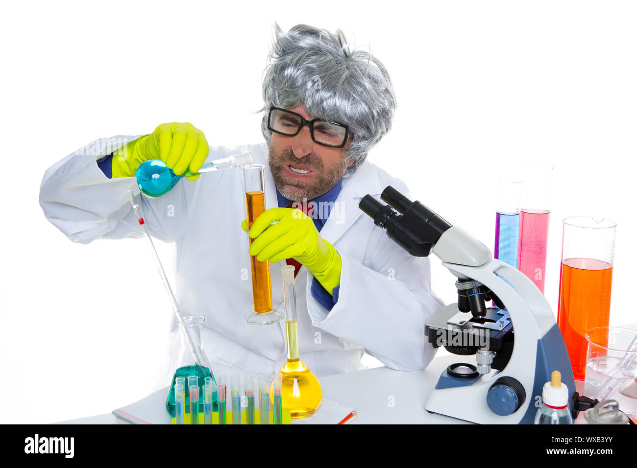 Crazy mad nerd scientist funny expression at laboratory on chemical ...