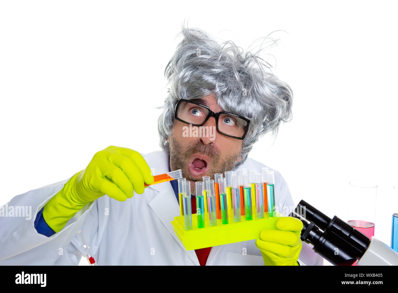 Crazy mad nerd scientist funny expression at laboratory on chemical ...