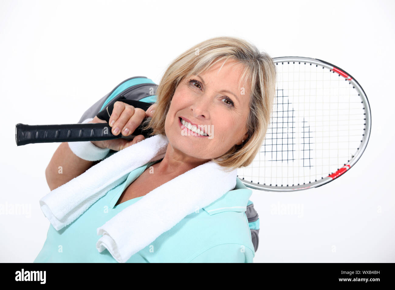Woman with tennis racket Stock Photo - Alamy