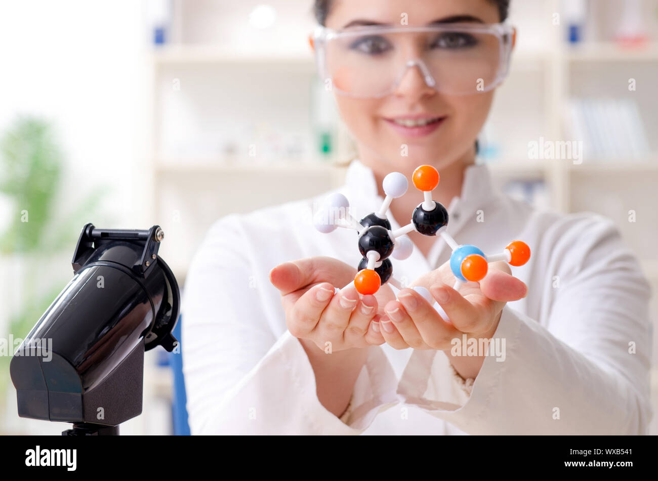 Young female chemist working in the lab Stock Photo - Alamy