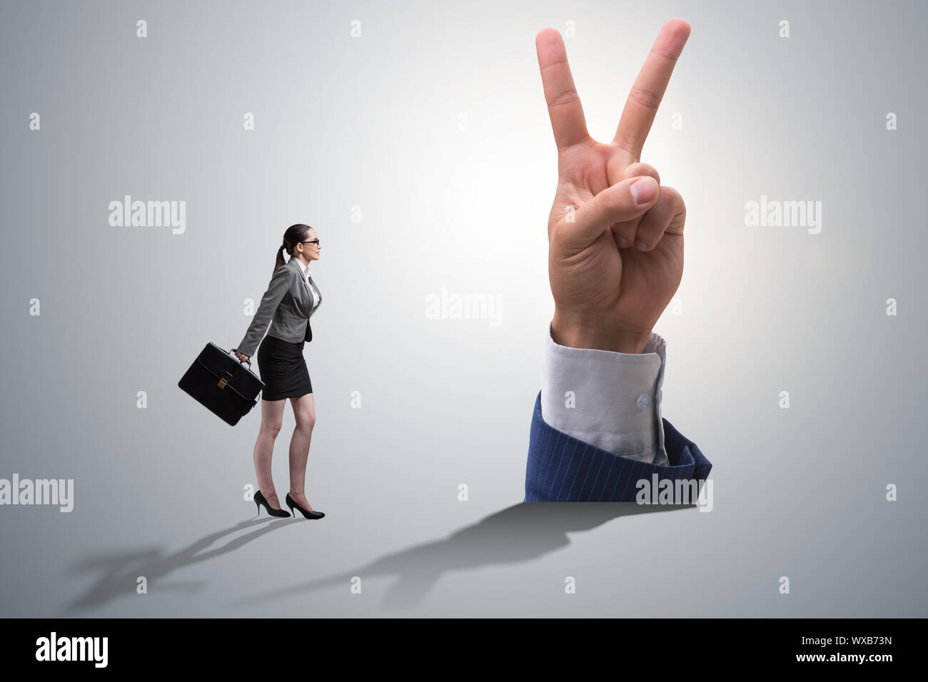 Hands showing victory sign in business concept Stock Photo - Alamy