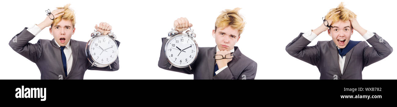 Young boy with alarm-clock in time management concept Stock Photo - Alamy