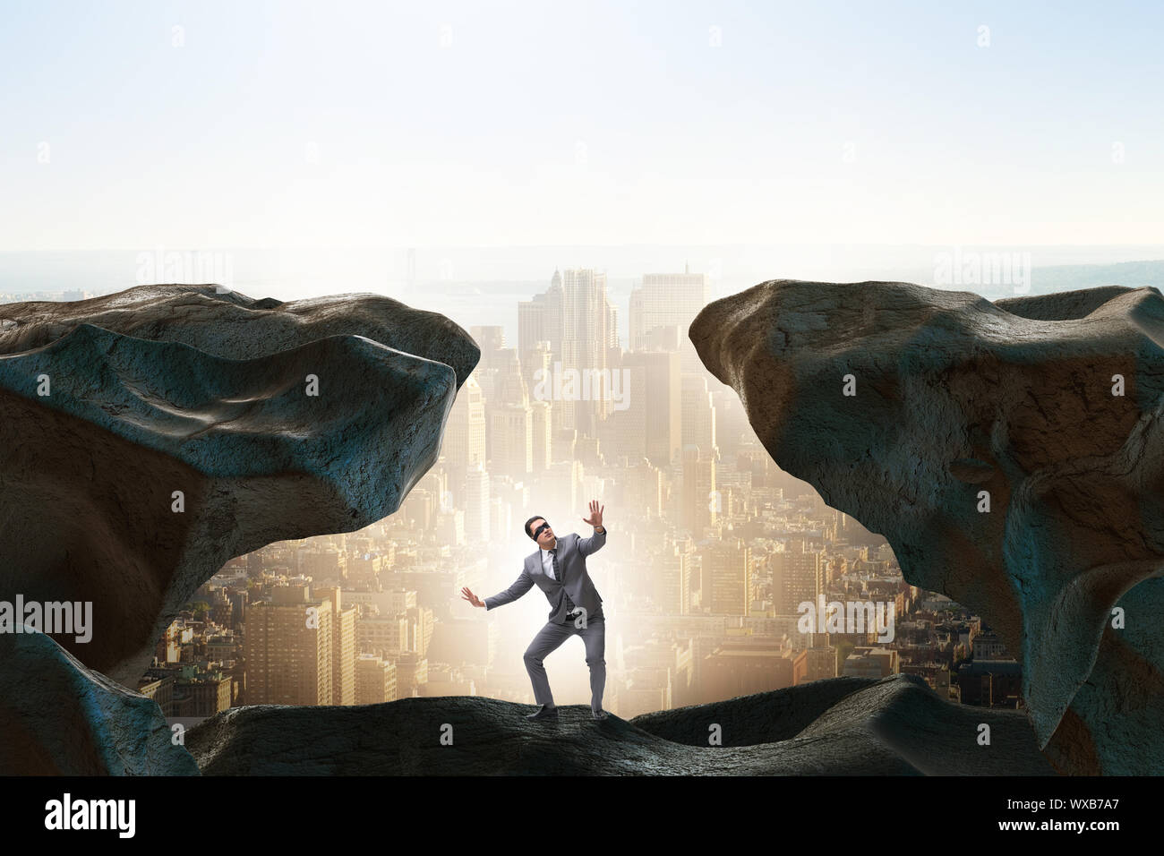 Businessman falling down mountain hi-res stock photography and images ...