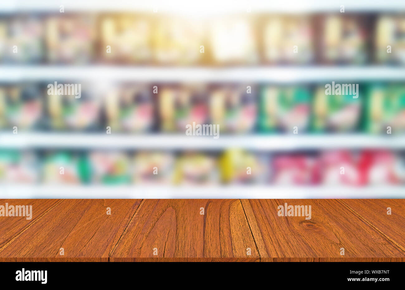 Wood table on food product shelf in supermarket, montage or display ...
