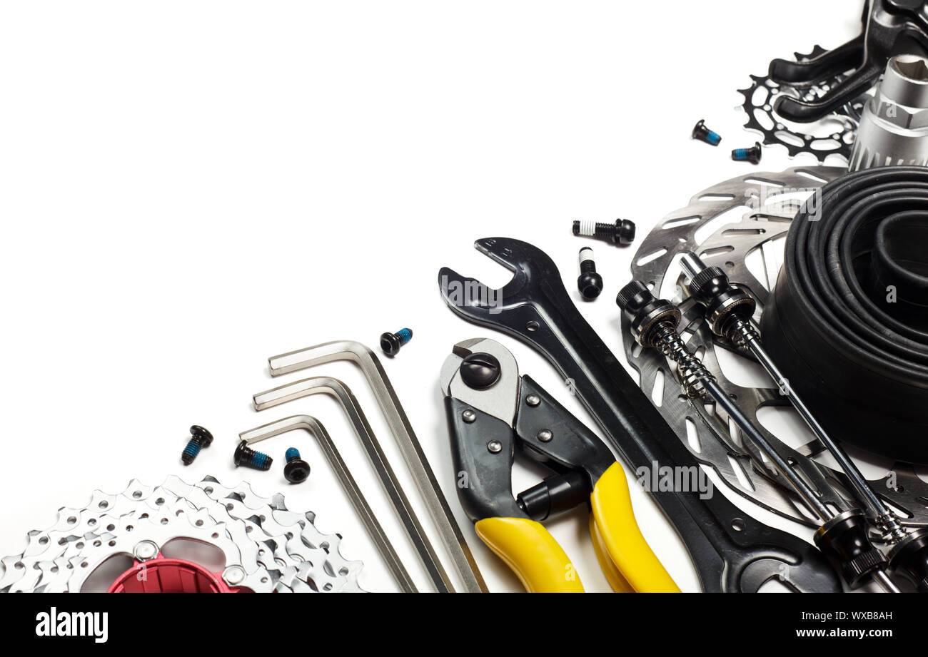 Mountain bike tools and spares on white background Stock Photo - Alamy
