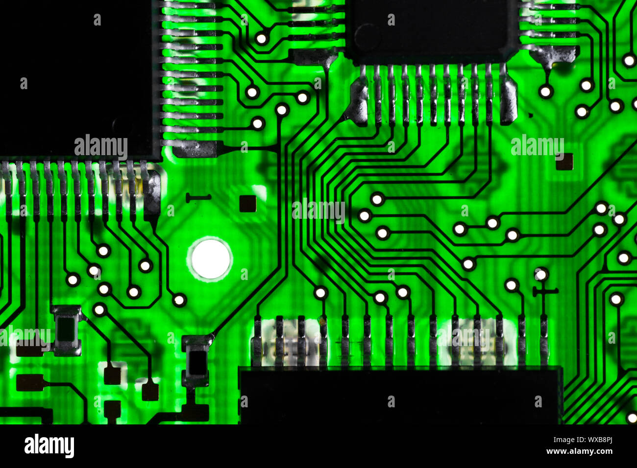 Green transparent circuit board with microchips Stock Photo - Alamy