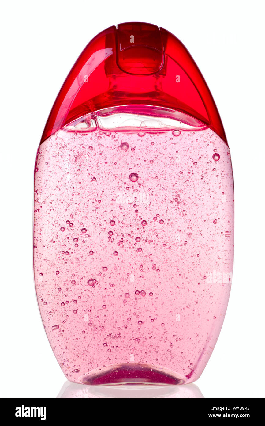 Crimson transparent shampoo bottle on white background Stock Photo - Alamy