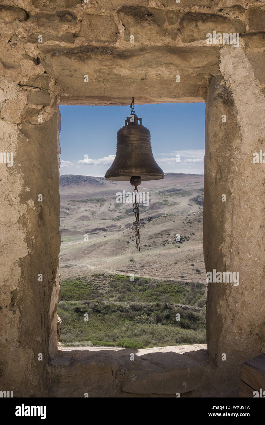 orthodox bell in arch with steppe background Stock Photo - Alamy