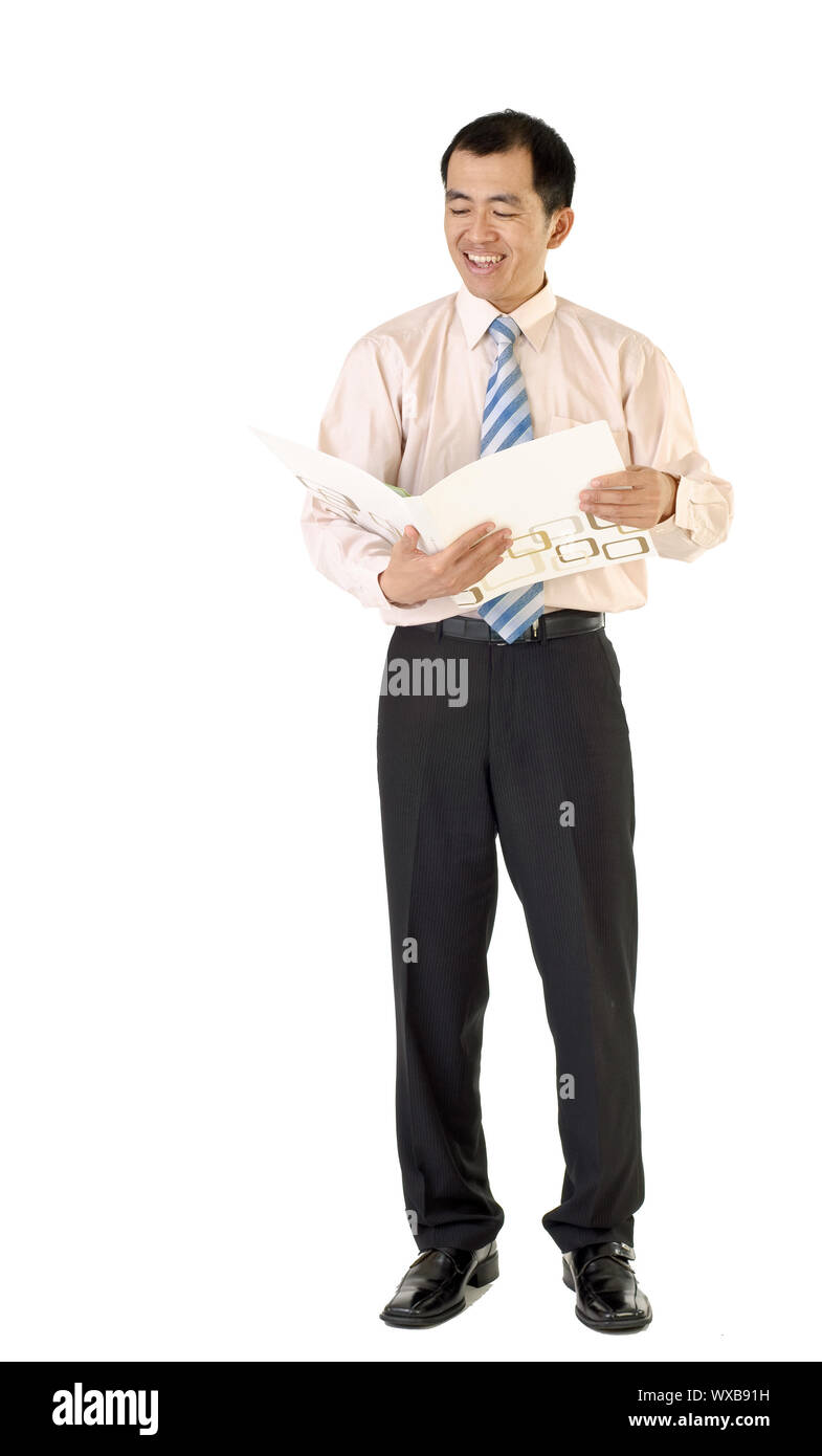 Businessman read report with smiling face on white background Stock ...