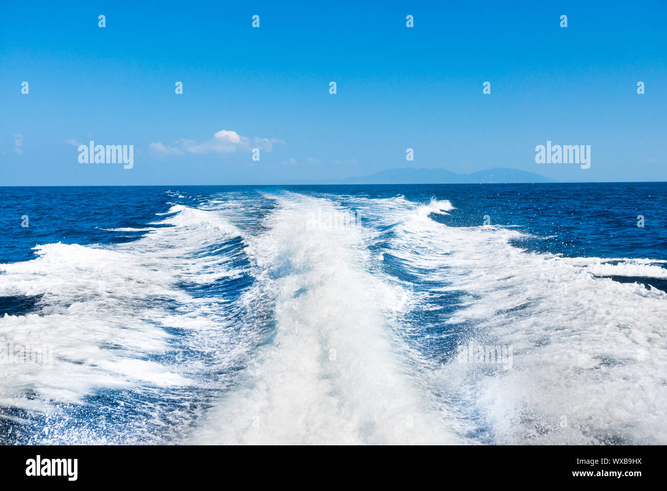 Wake of boat on water surface Stock Photo - Alamy