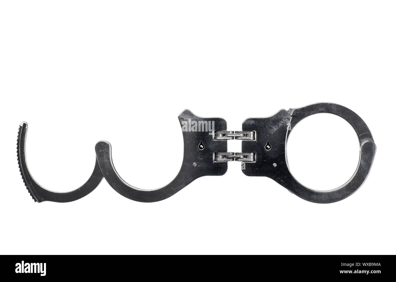 Open handcuffs on white background Stock Photo - Alamy