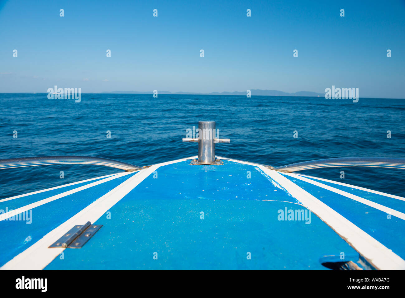 View to blue sea from boat head Stock Photo - Alamy