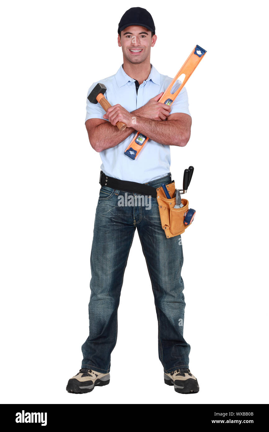 Craftsman with spirit-level Stock Photo - Alamy