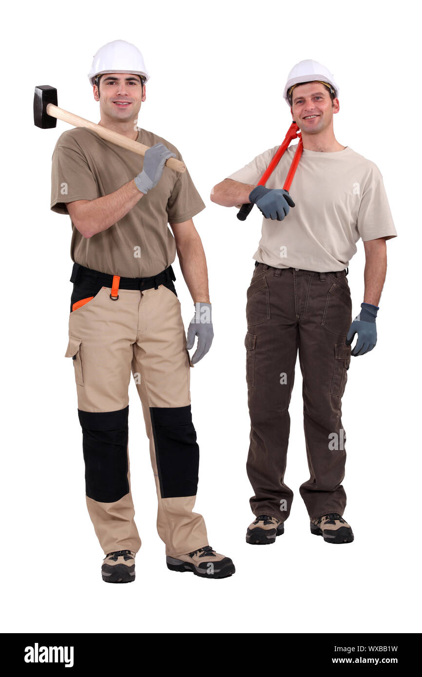Tradesmen holding their tools Stock Photo - Alamy