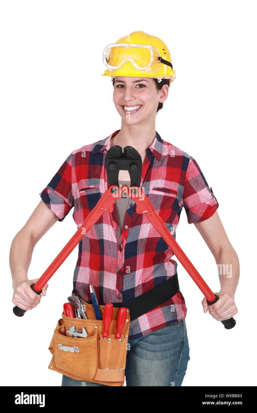 Woman with tools and boltcutters Stock Photo - Alamy