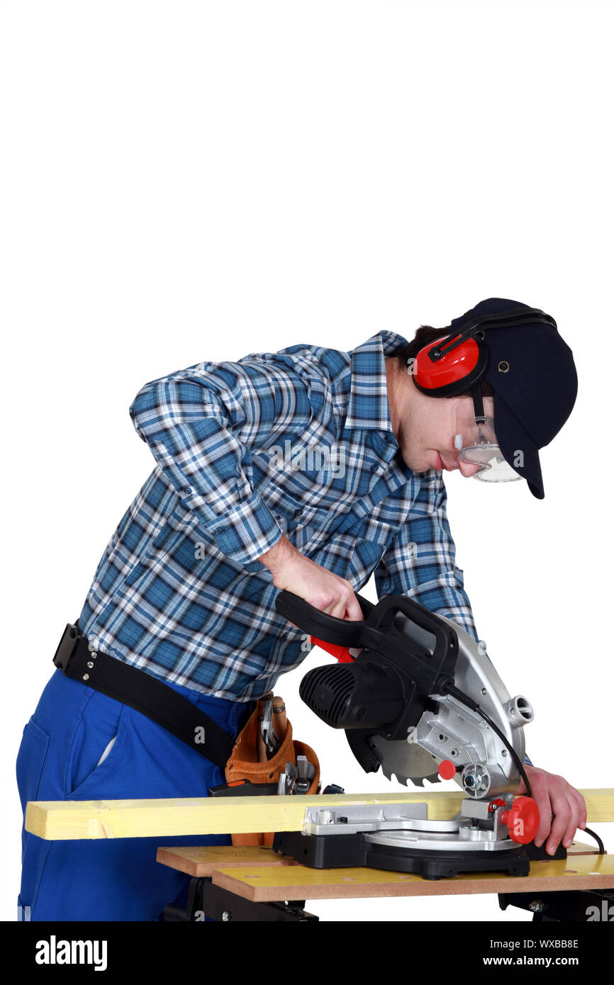 joiner at work with workbench and machine Stock Photo - Alamy