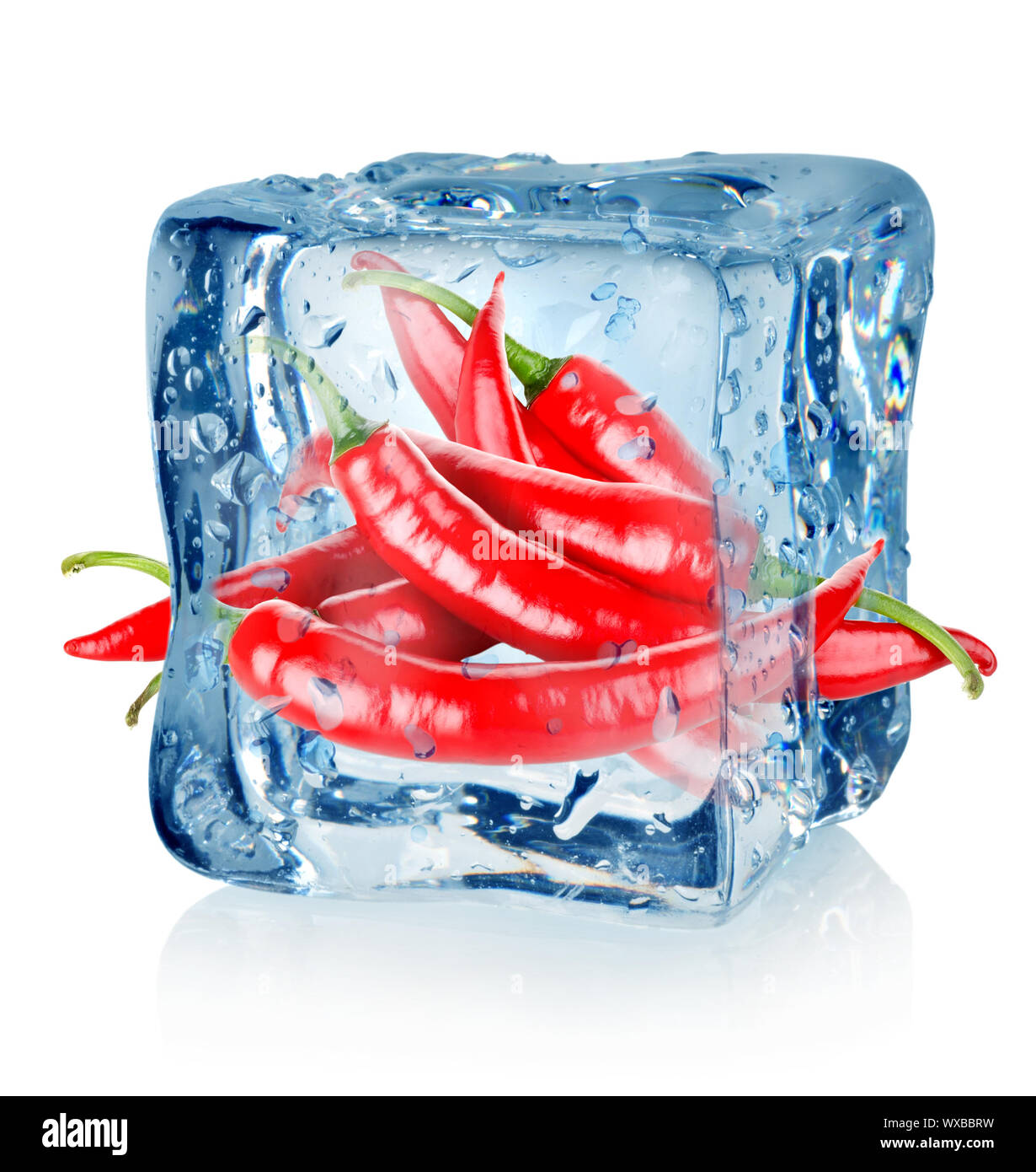 Ice cube and chili peppers isolated on a white background Stock Photo ...
