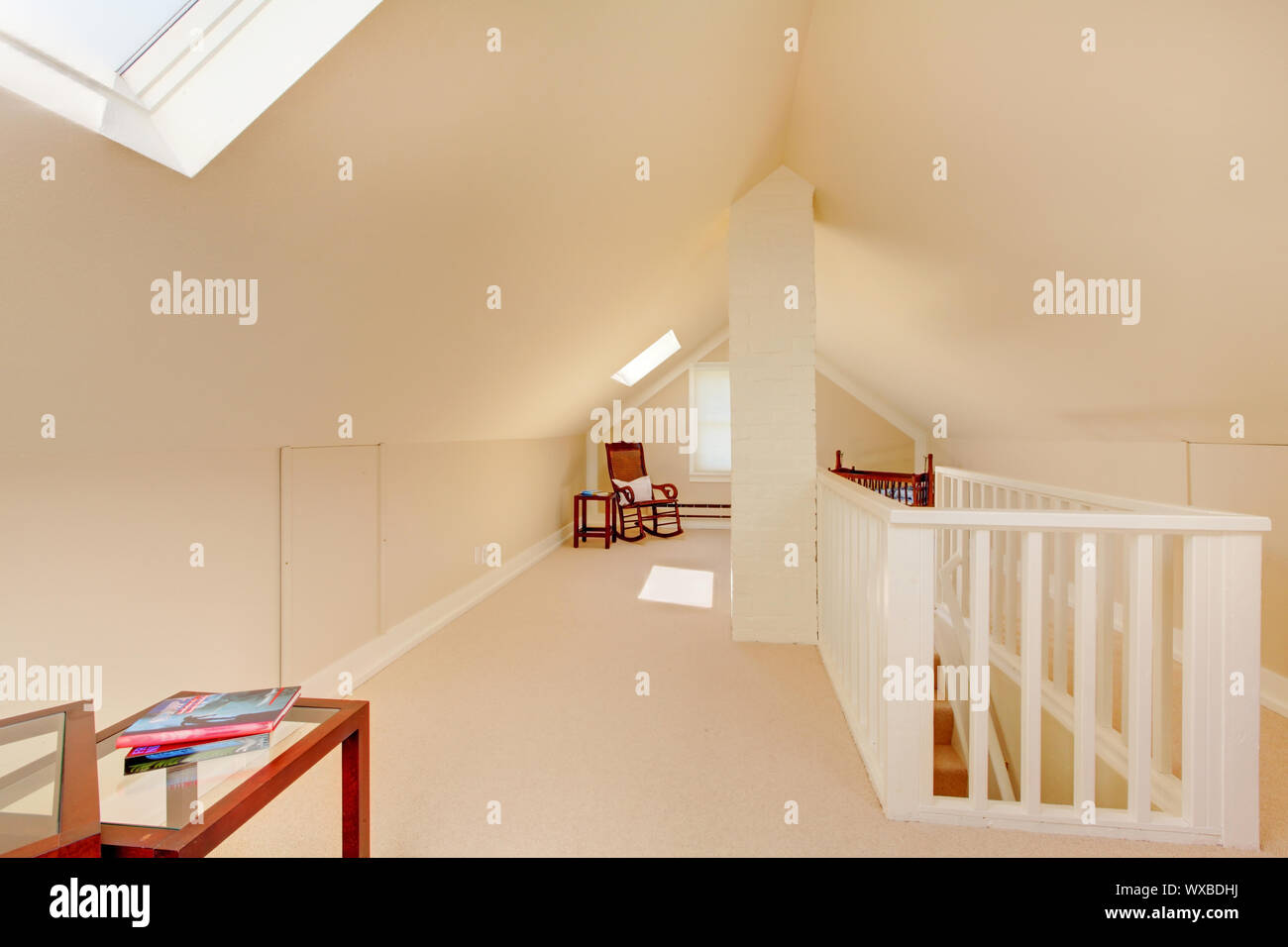 Bright clean attic in the small home with beige carpet Stock Photo - Alamy