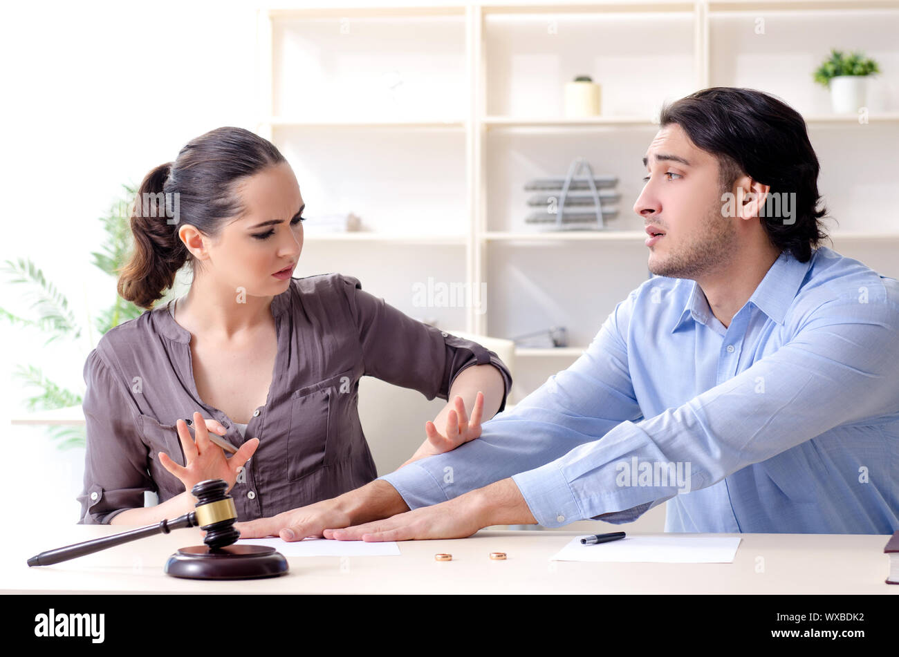Young family in marriage divorce concept Stock Photo - Alamy