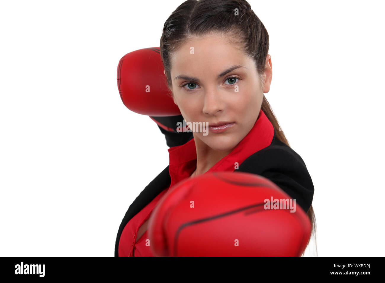 Woman throwing a punch Stock Photo - Alamy