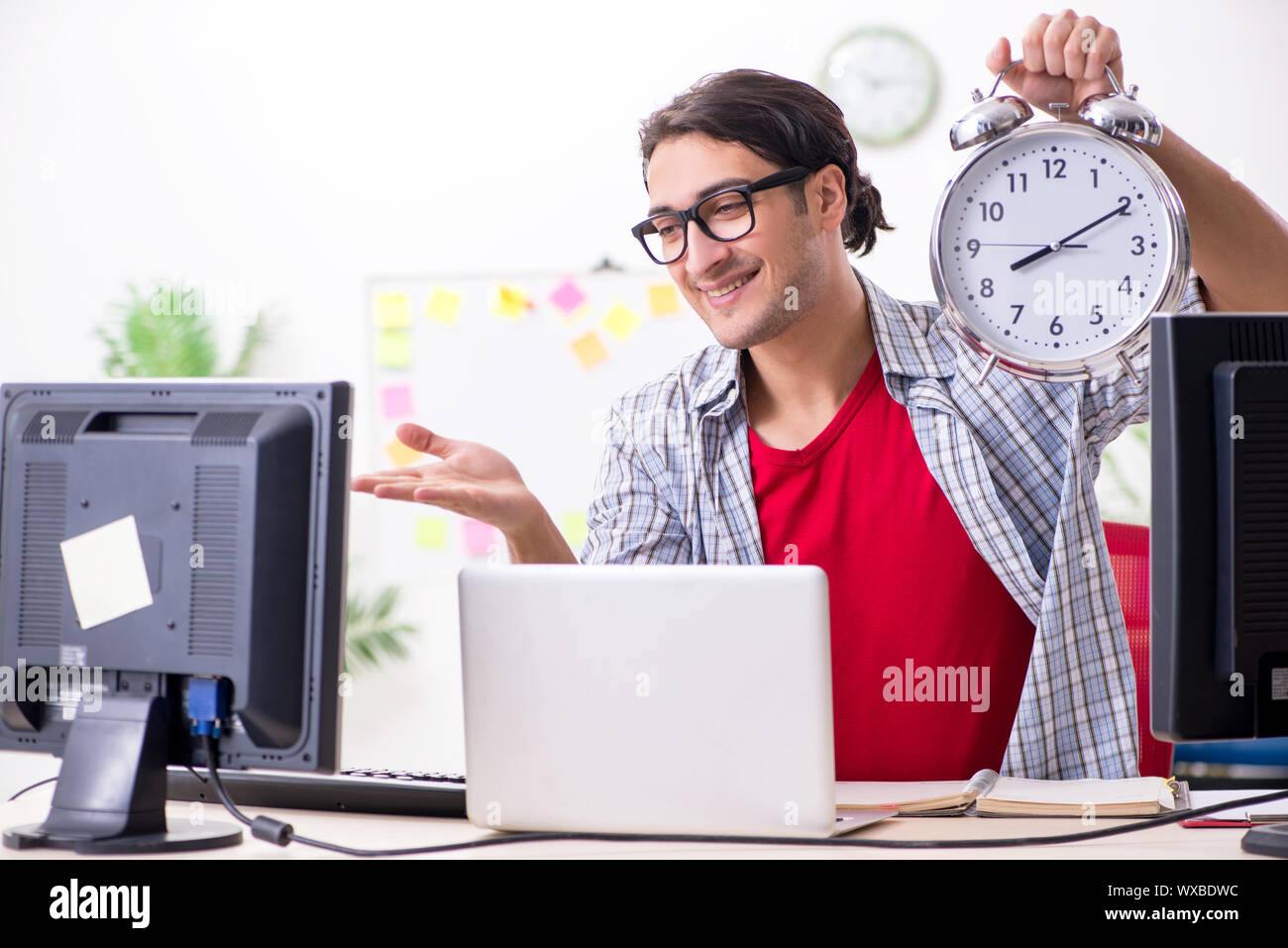 Male it specialist working in the office Stock Photo - Alamy