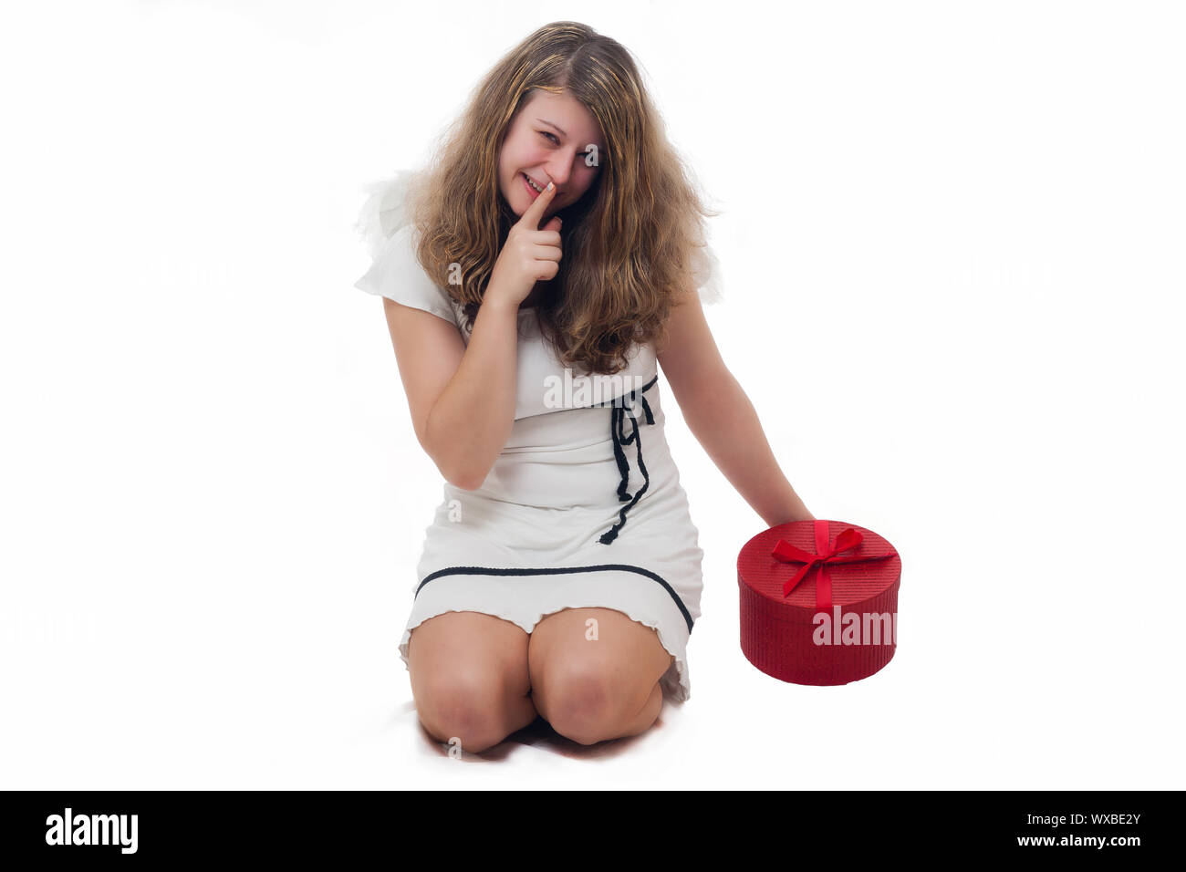 smiling christmas angel with golden hair on white background with wings ...
