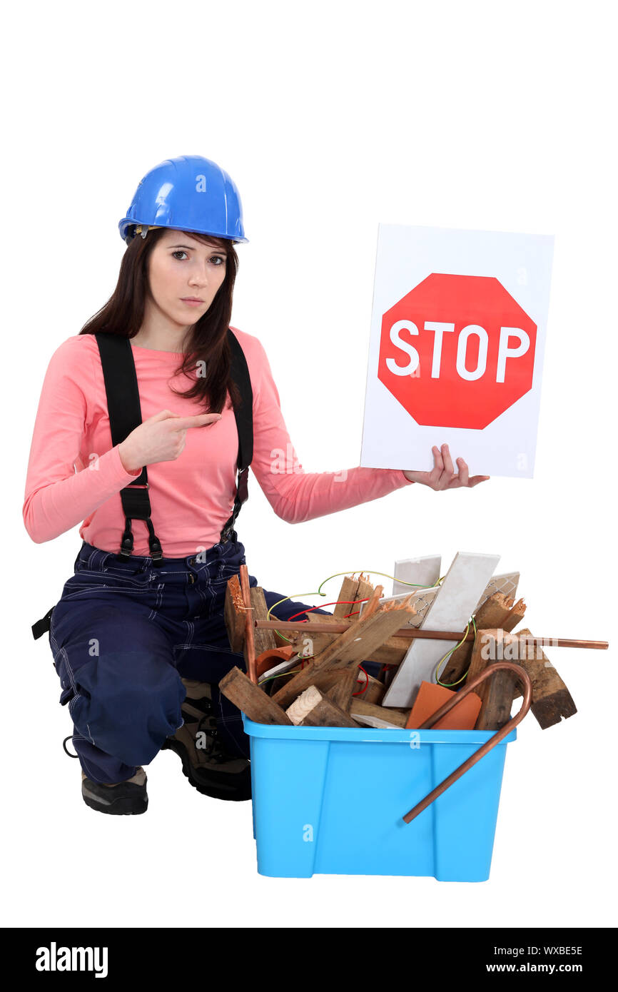 Woman holding stop sign Stock Photo - Alamy Woman holding stop sign Stock Photo - Alamy