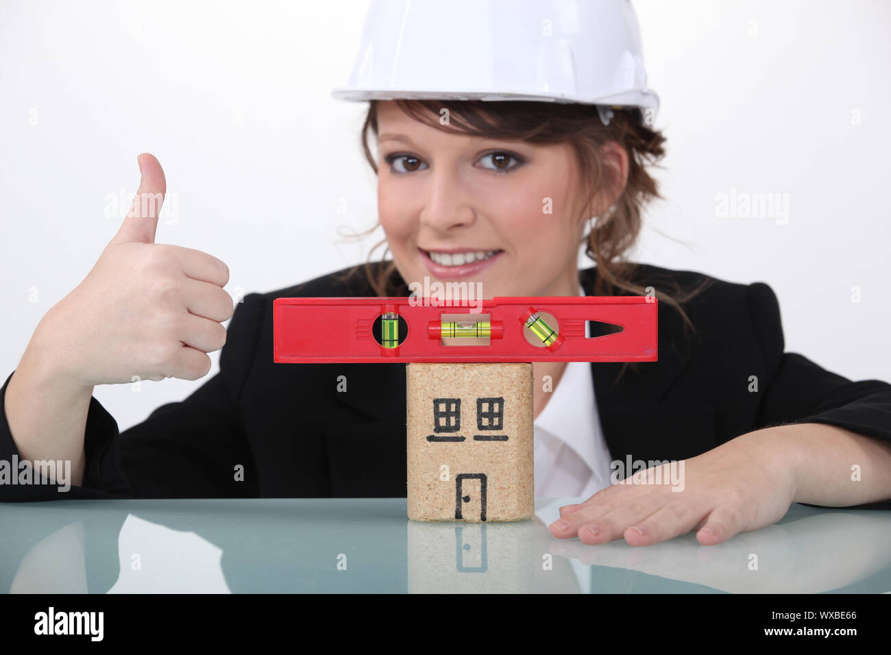 Engineer approving the use of a spirit level Stock Photo - Alamy