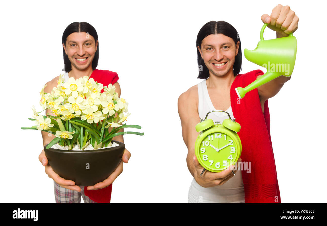 Young man watering flowers isolated on white Stock Photo - Alamy