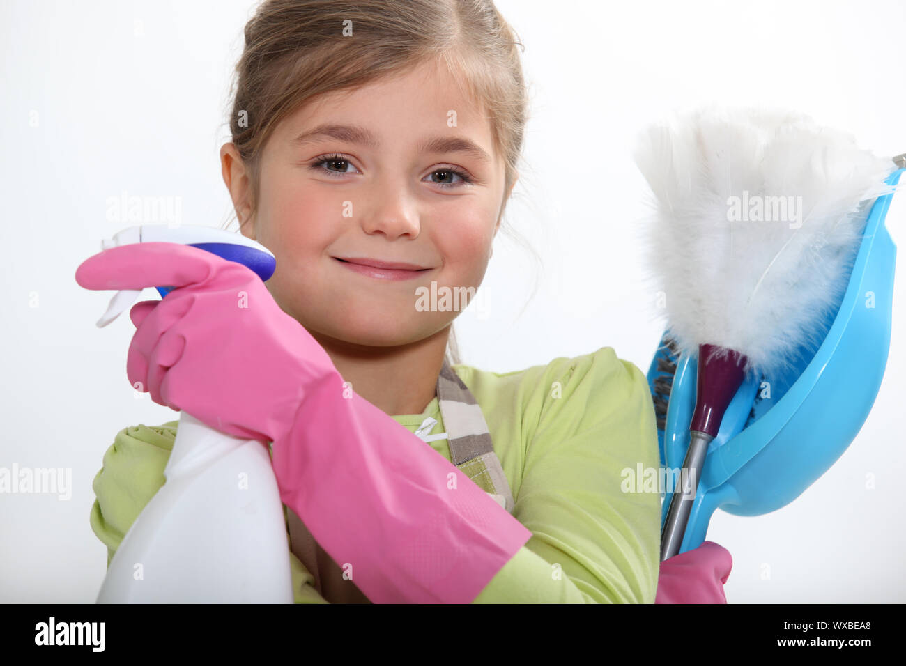 Girl with cleaning products Stock Photo - Alamy