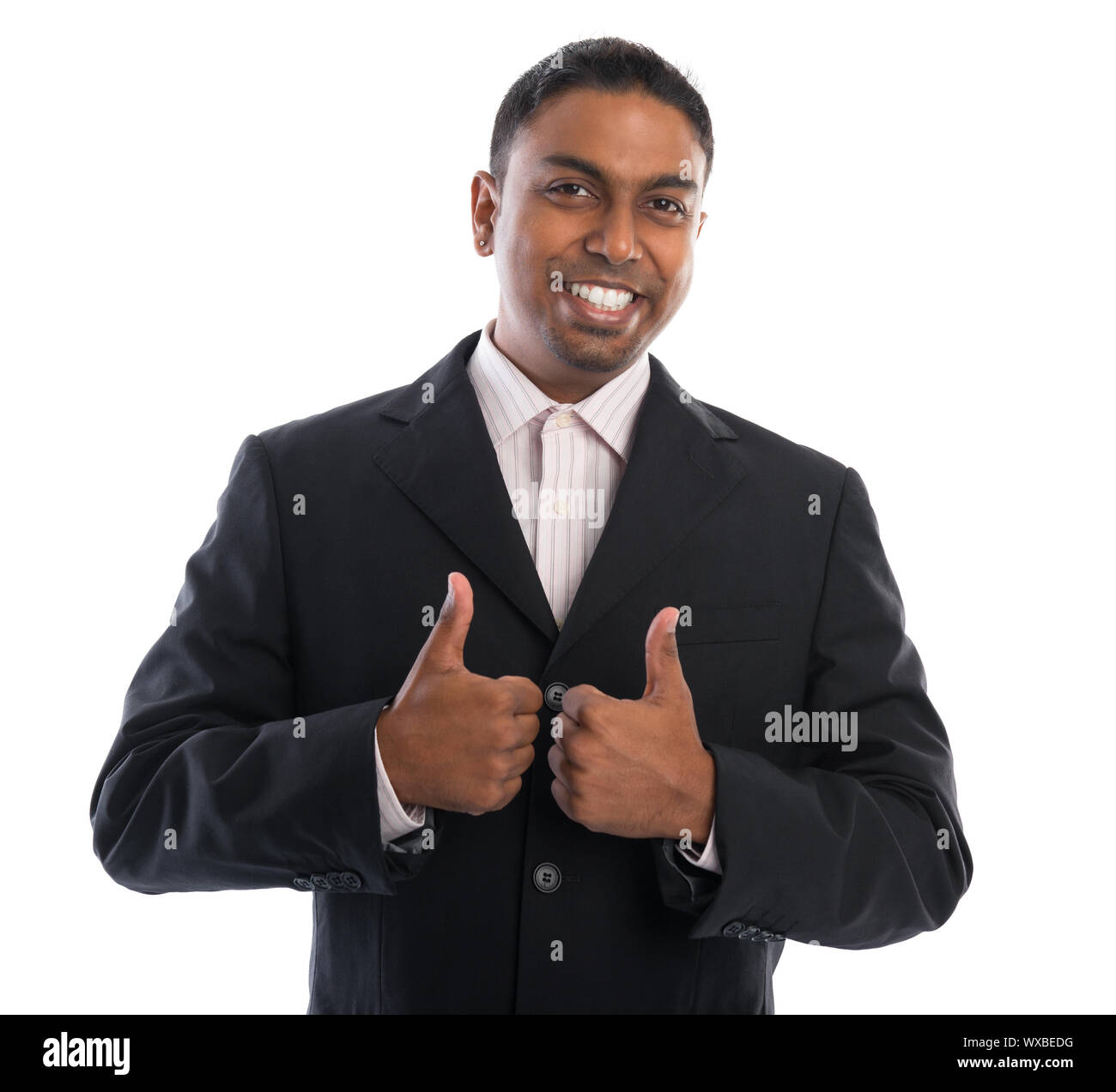 Thumbs up 30s Indian businessman giving thumbs up over white background ...