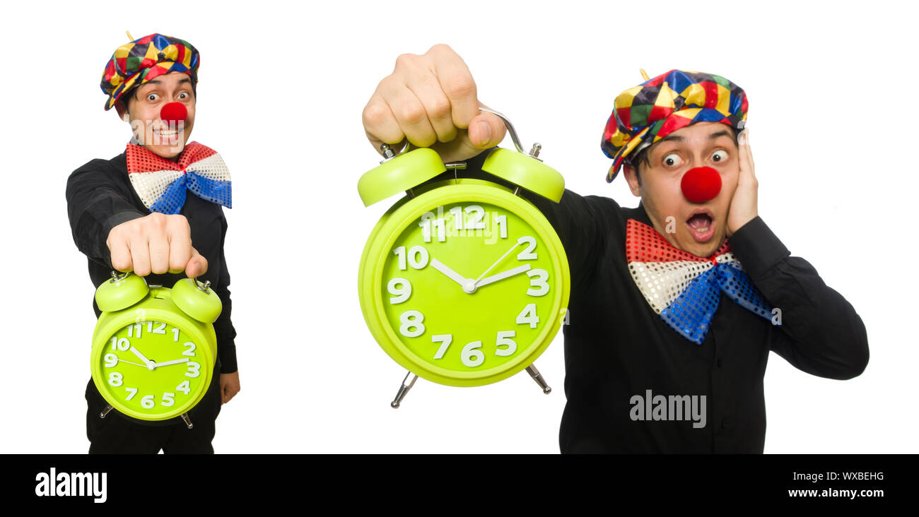 Funny clown with clock isolated on white Stock Photo - Alamy