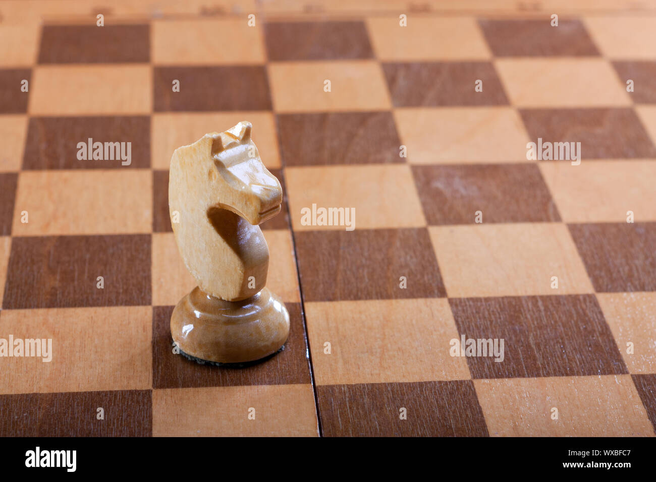 the knight chess piece on a Board Stock Photo - Alamy
