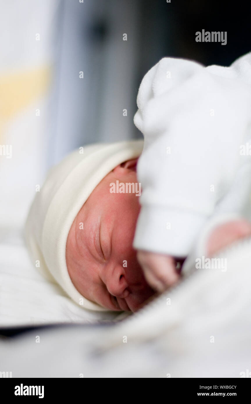 Just born baby sleeping Stock Photo - Alamy