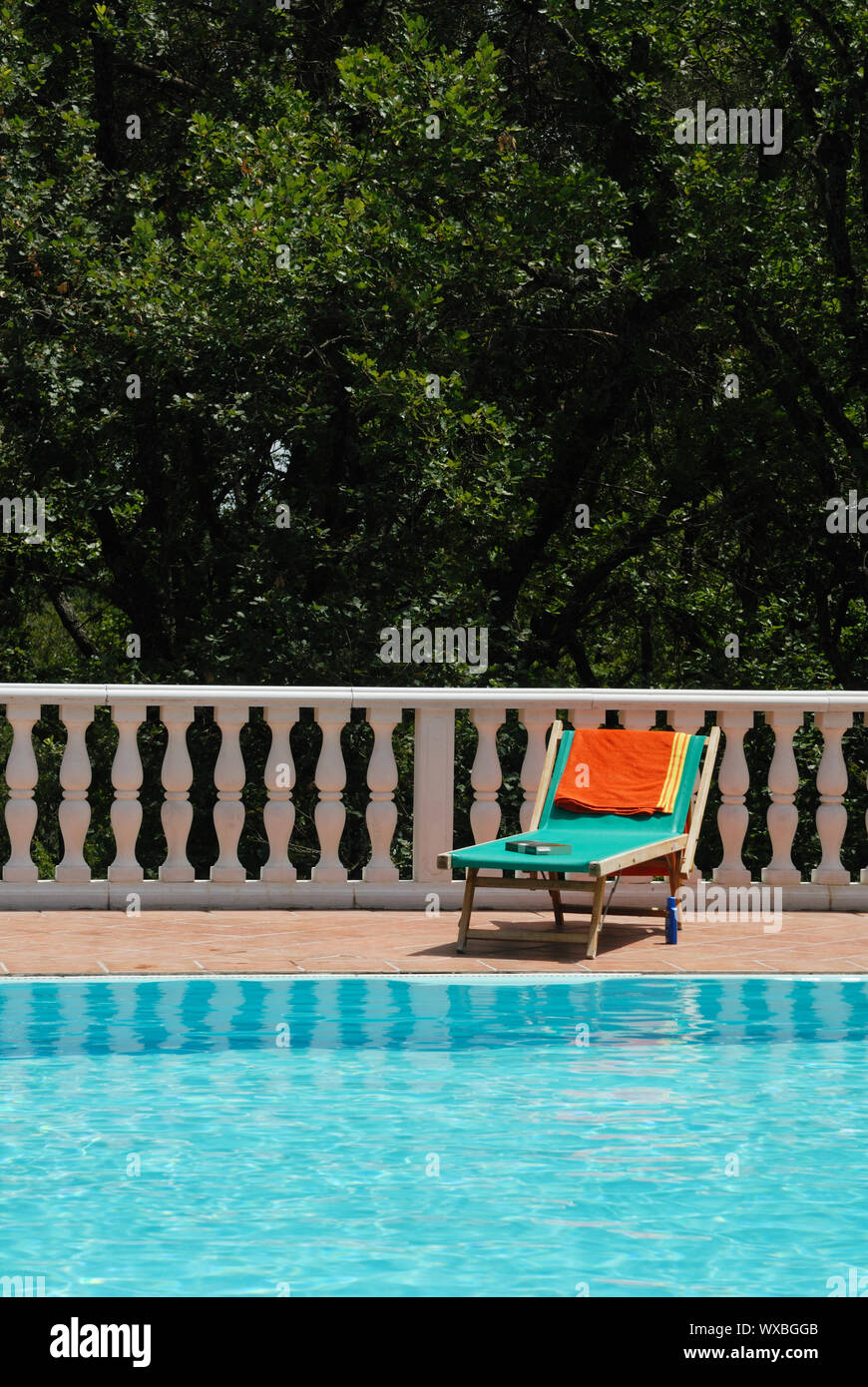 sun bed at the luxury swimming pool Stock Photo - Alamy