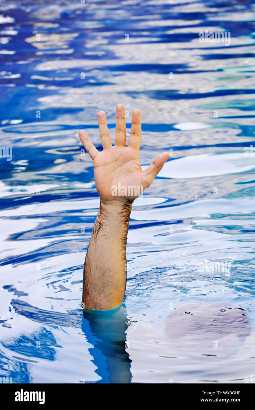 Hand of drowning man needing help and assistance Stock Photo - Alamy