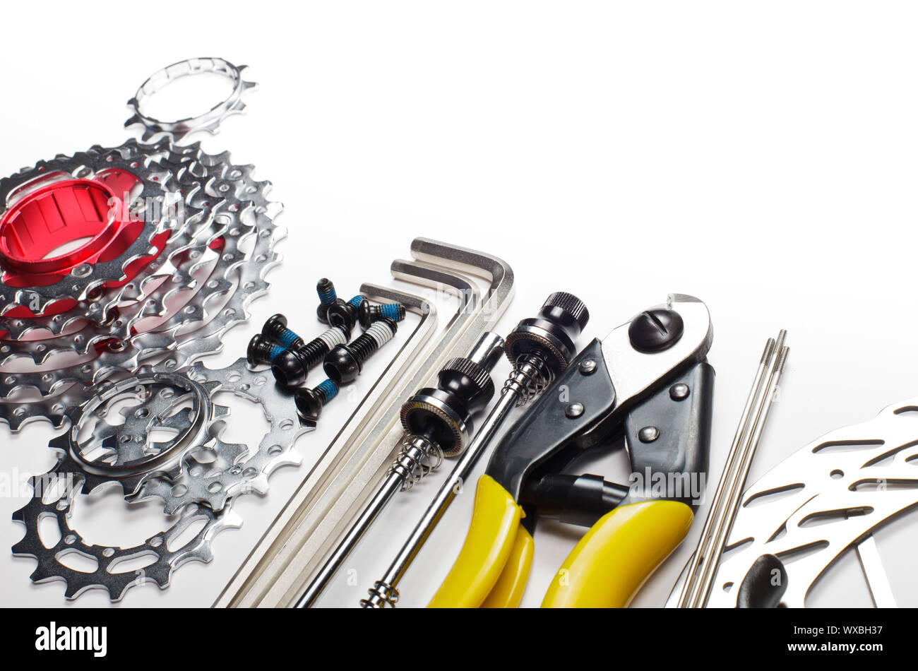 Mountain bike tools and spares on white background Stock Photo - Alamy